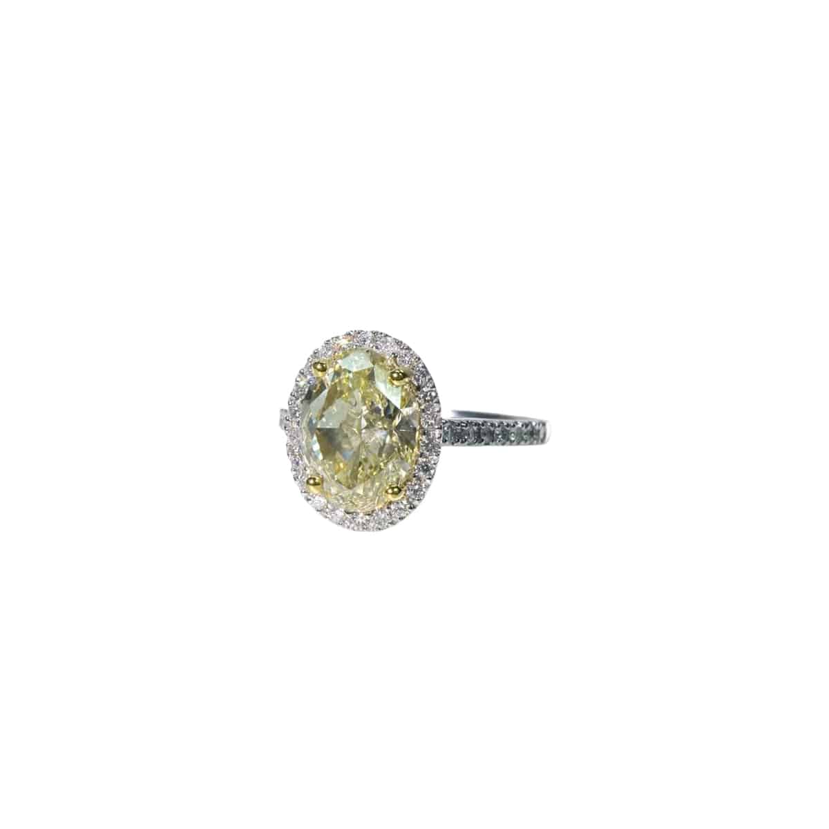 DeRocks Oval Shaped Fancy Yellow Diamond Ring in 18k Yellow and White ...