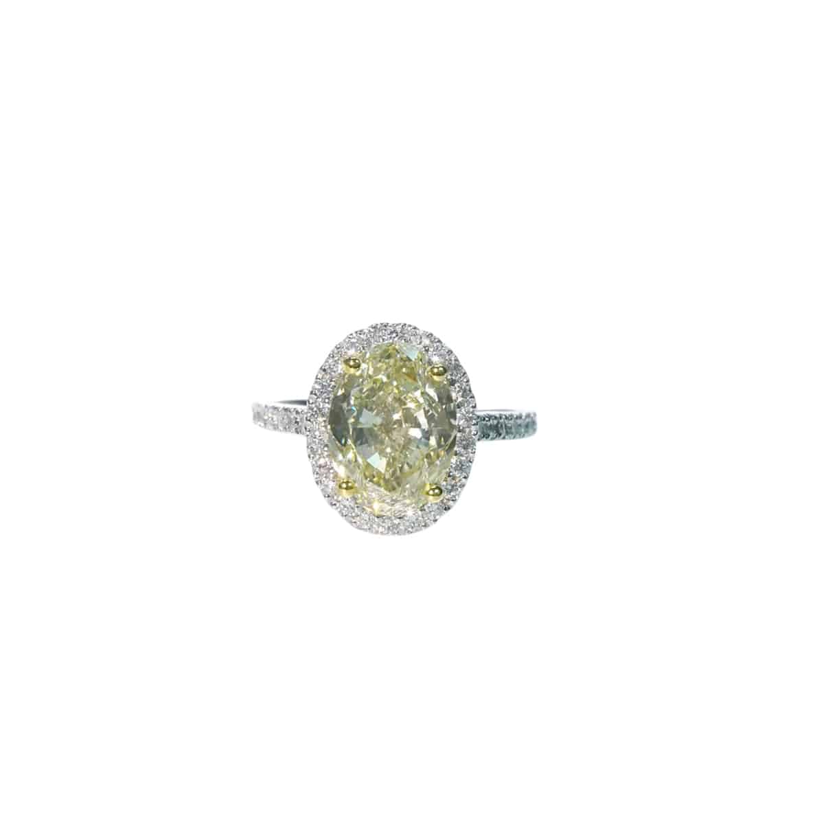 DeRocks Oval Shaped Fancy Yellow Diamond Ring in 18k Yellow and White ...